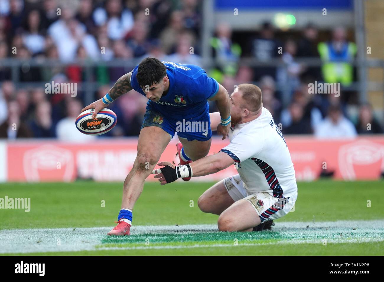 London, England. 9th March, 2025. Italy's Tommaso Menoncello scores a ...