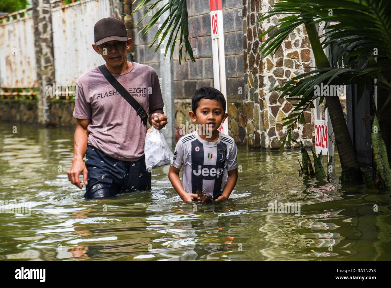 March 9, 2025, Bandung Regency, West Java, Indonesia: Residents walking ...