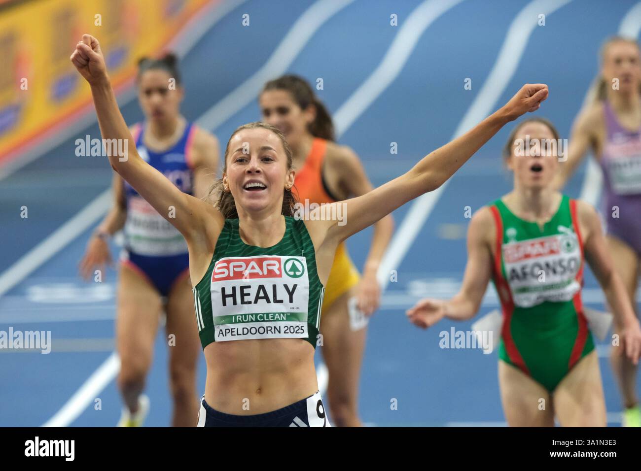 Winner Ireland's Sarah Healy celebrates at the finish of the 3000m ...