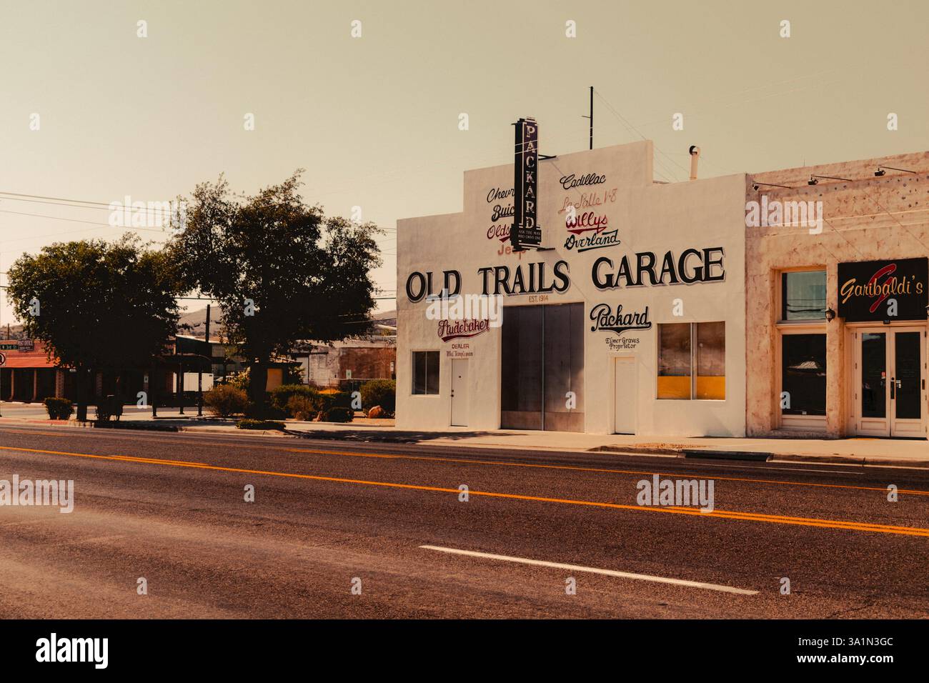 Vintage building on Route 66, featuring classic car brand signs and ...