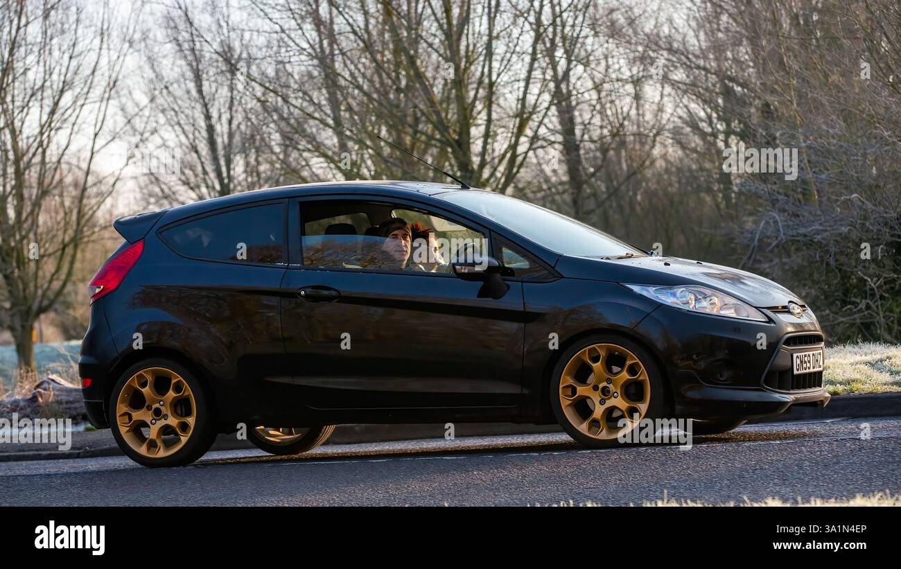 Stony Stratford,UK - Mar. 2nd 2025: 2009 black Ford Fiesta car driving ...