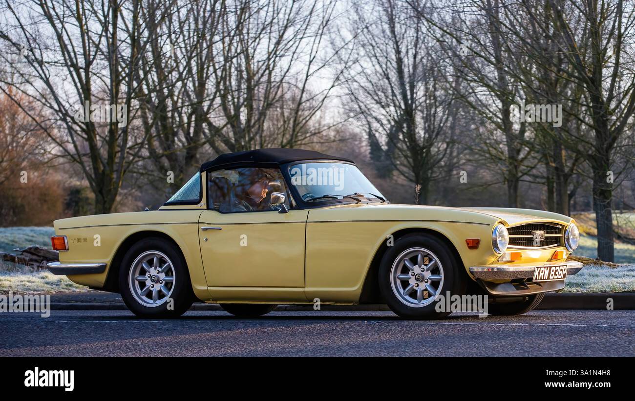 Stony Stratford,UK - Mar. 2nd 2025: 1975 yellow Triumph TR6 classic car ...