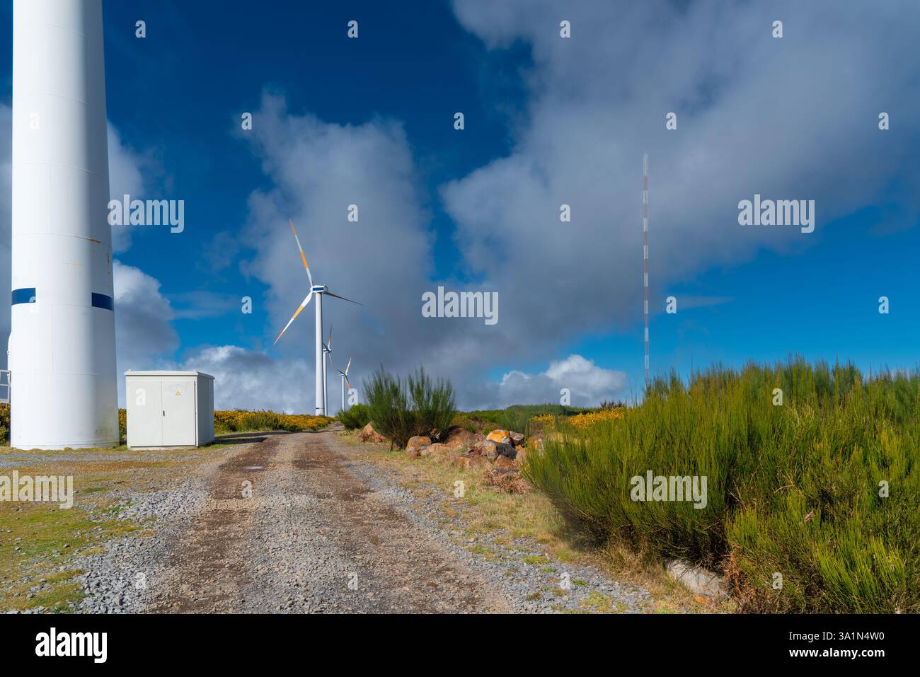 Wind turbines, partly hidden in the clouds on the plateu Paul da Serra ...