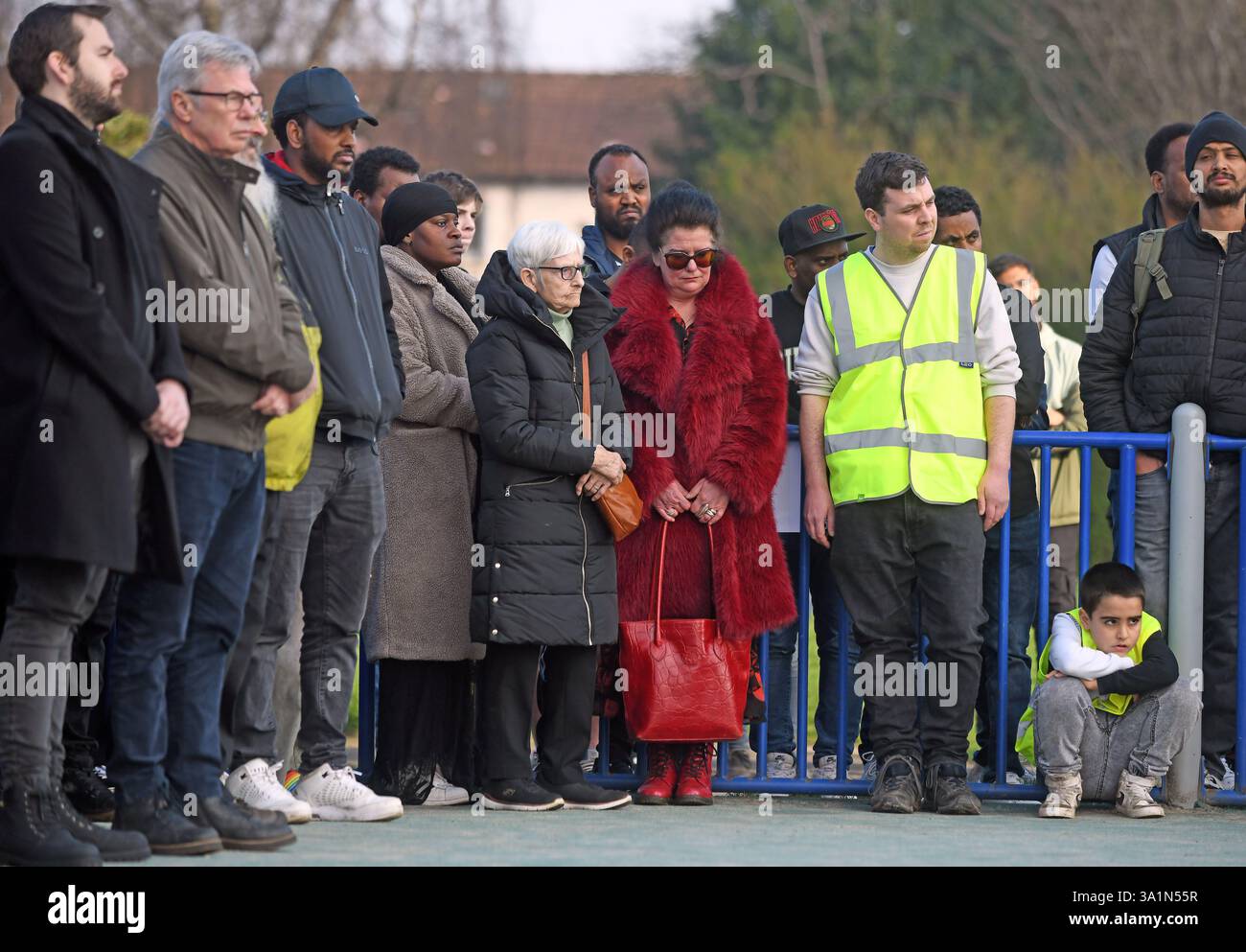 People attend a vigil on Danes Drive Park in Glasgow for Eritrean ...