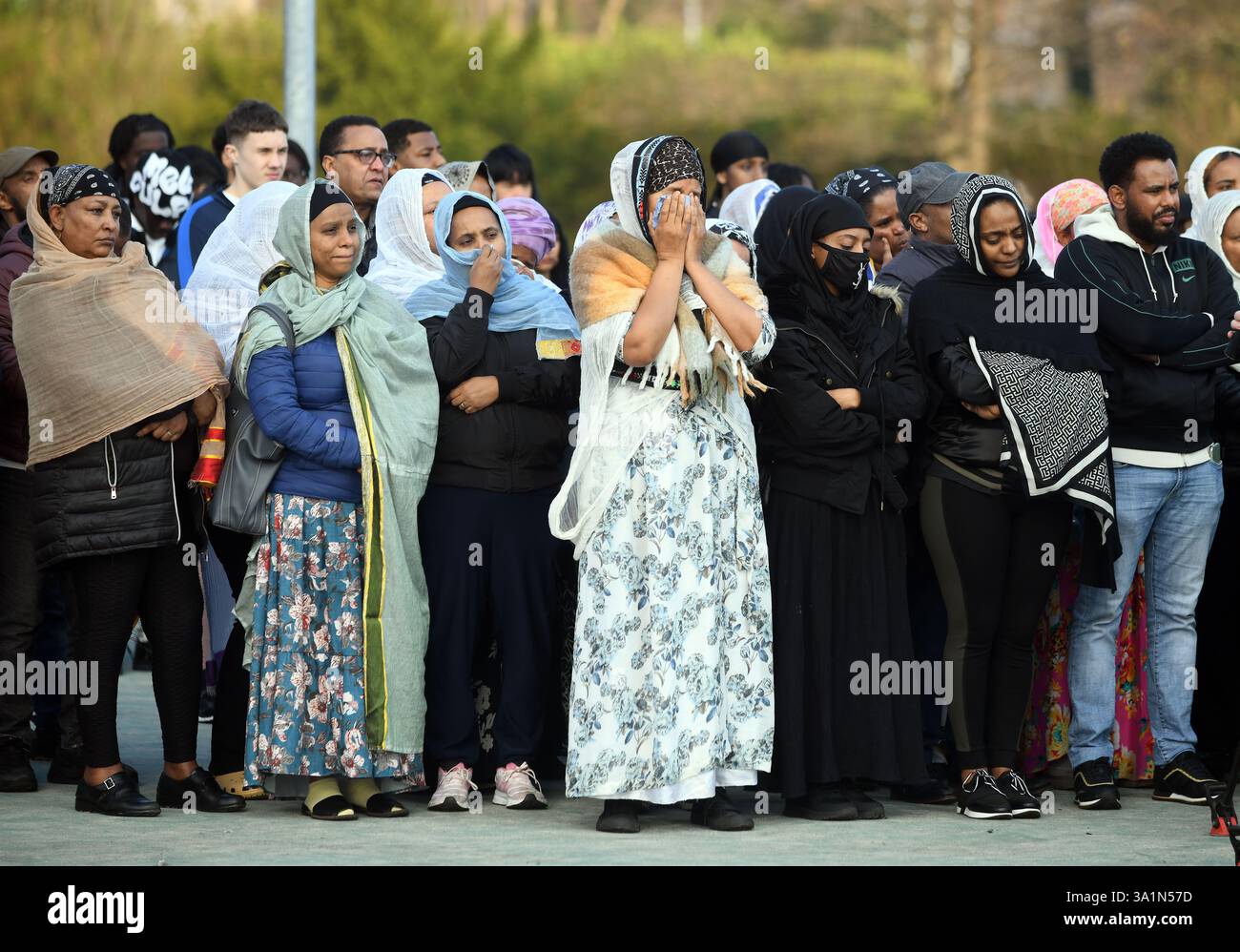People attend a vigil on Danes Drive Park in Glasgow for Eritrean ...