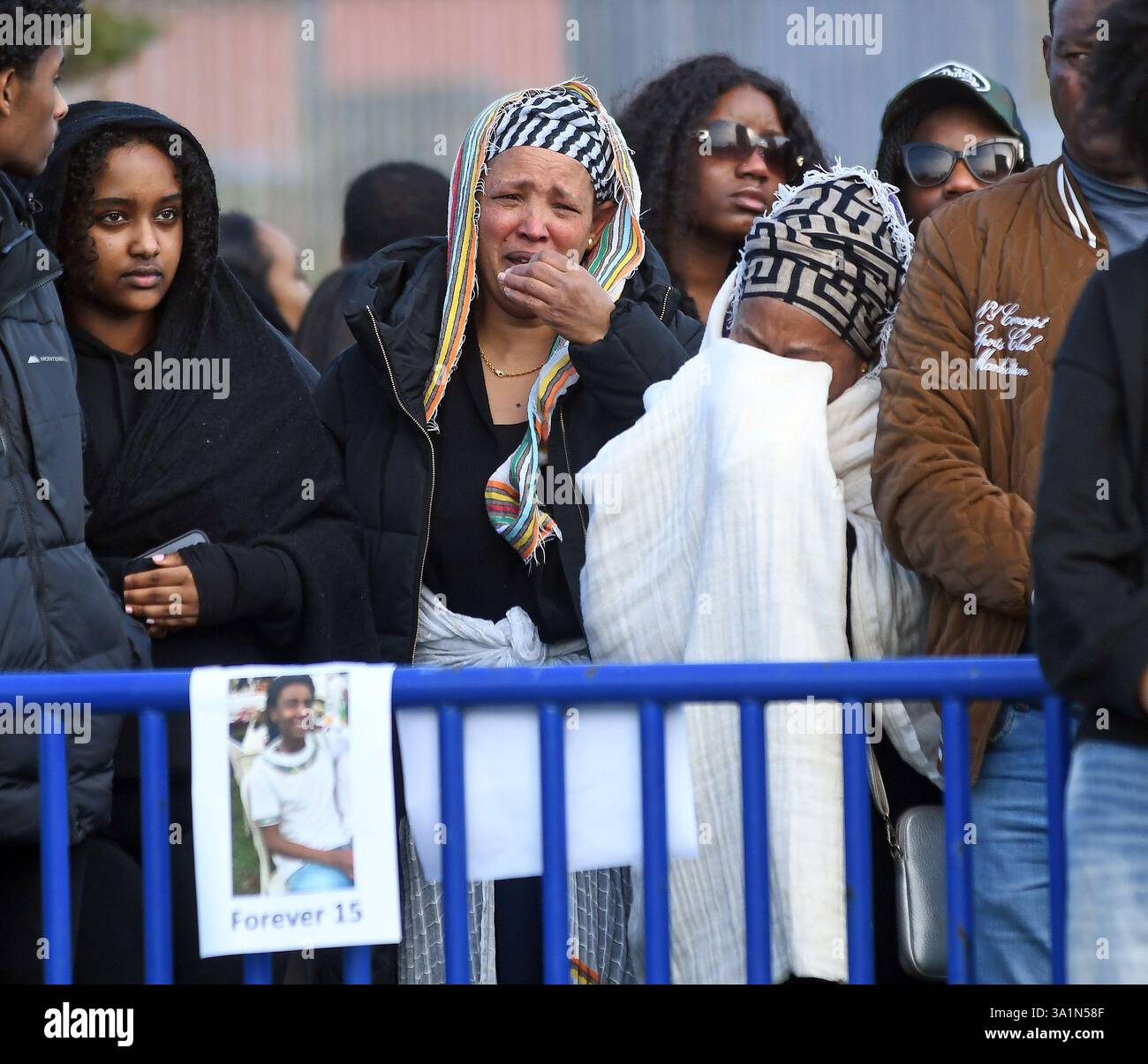People attend a vigil on Danes Drive Park in Glasgow for Eritrean ...