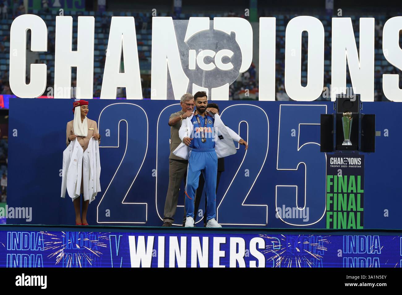 India's Virat Kohli receives the white coat from BCCI President Roger ...