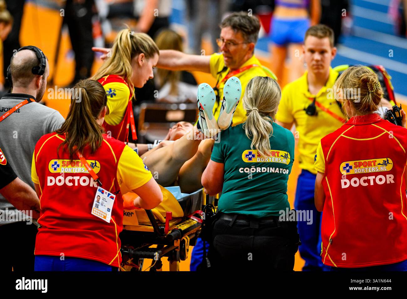Dutch Maureen Koster receives medical treatment during the European ...