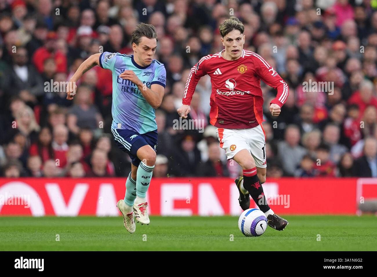 Manchester United's Alejandro Garnacho (right) and Arsenal's Leandro ...