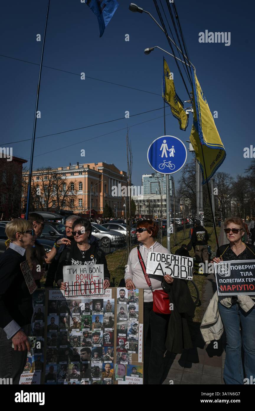 Kyiv, Ukraine. 09th Mar, 2025. Ukrainian protesters hold signs and ...