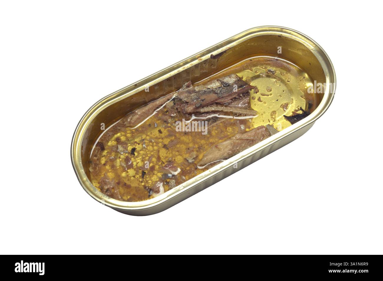 canned fish, sardines in oil. remains fish spine in an open tin can ...