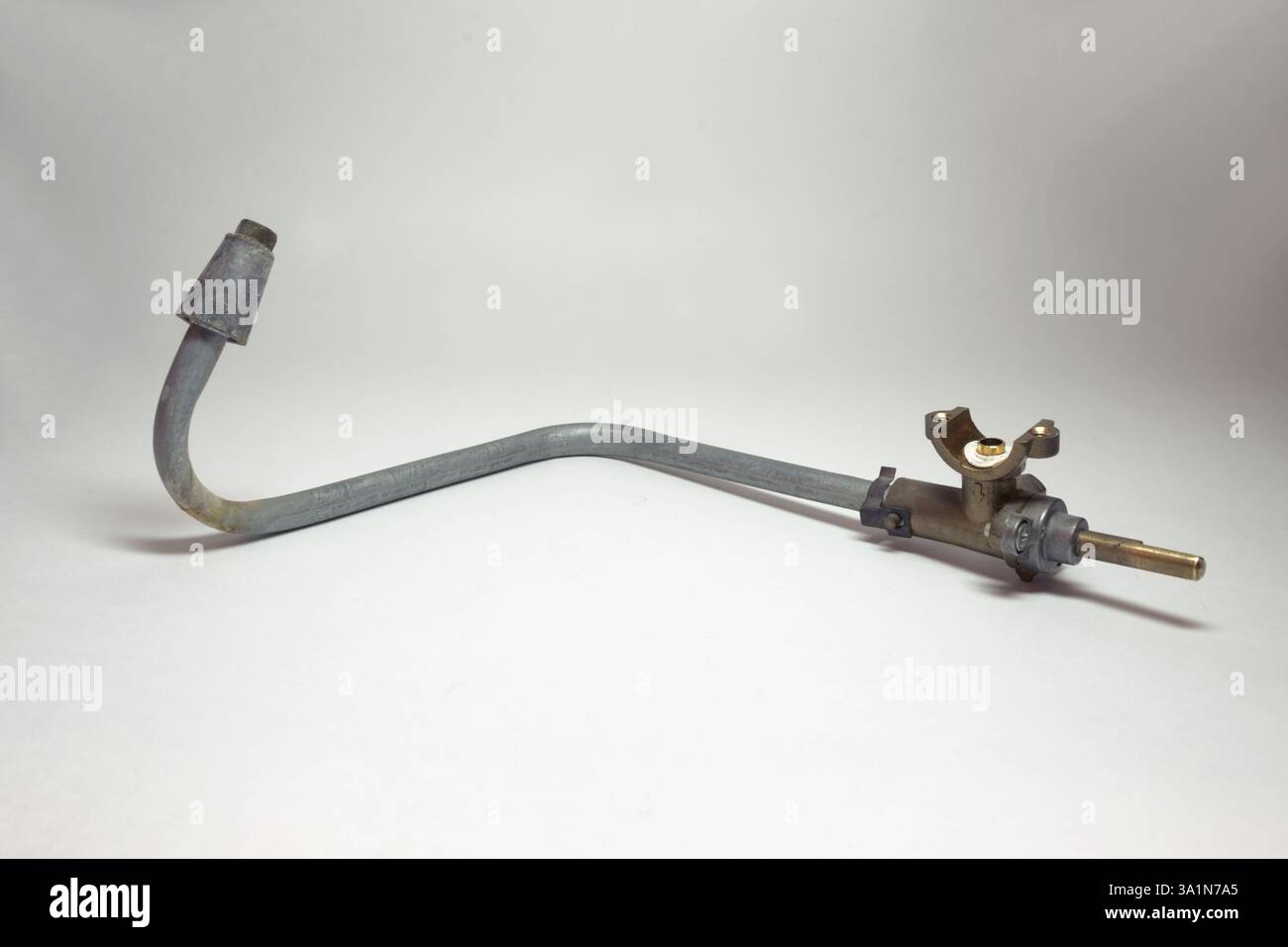 surface burner tube, curved, with gas regulating stove tap Stock Photo ...