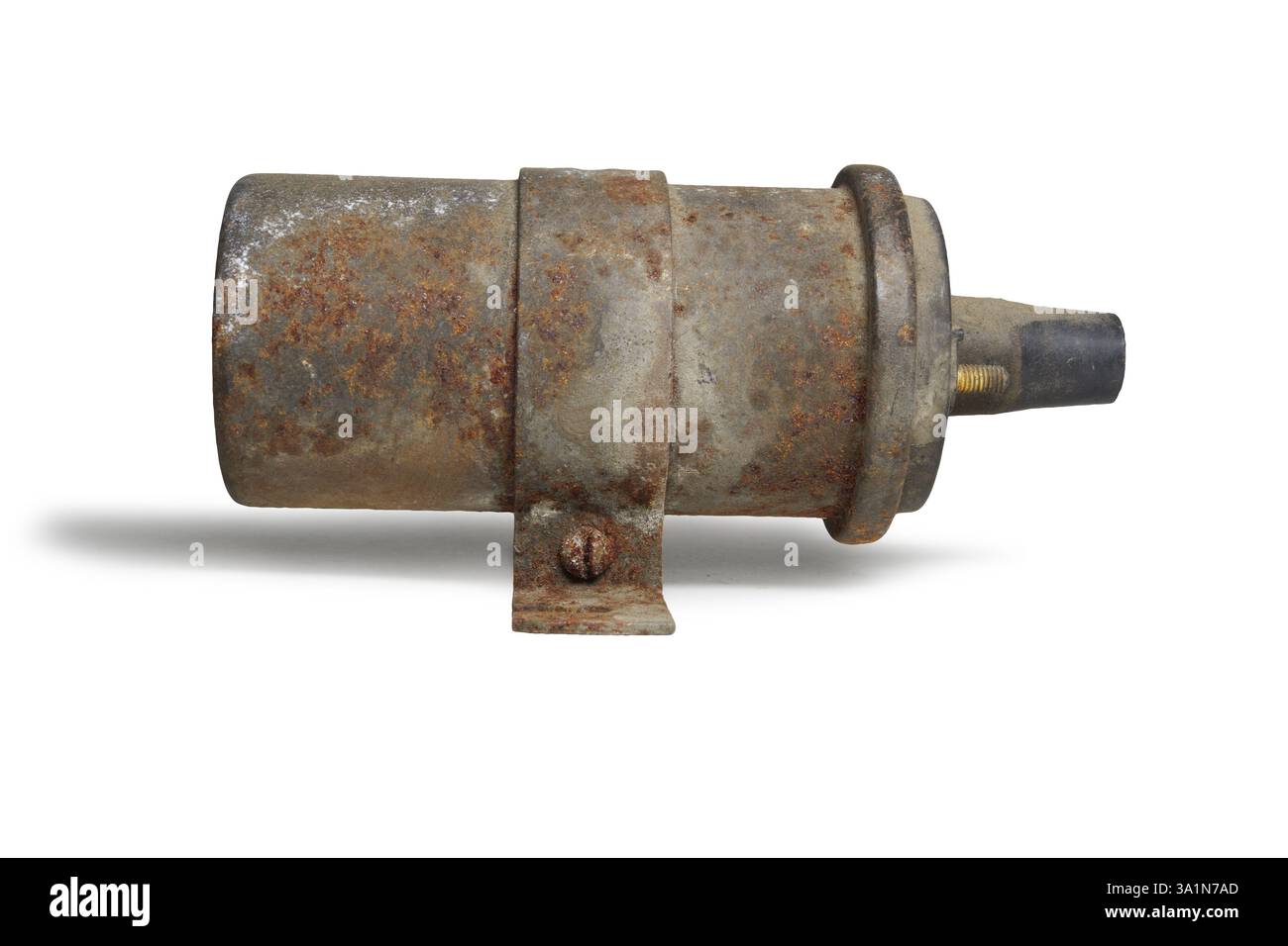 conventional ignition coil in clamp with holes for fixing the coil. old ...