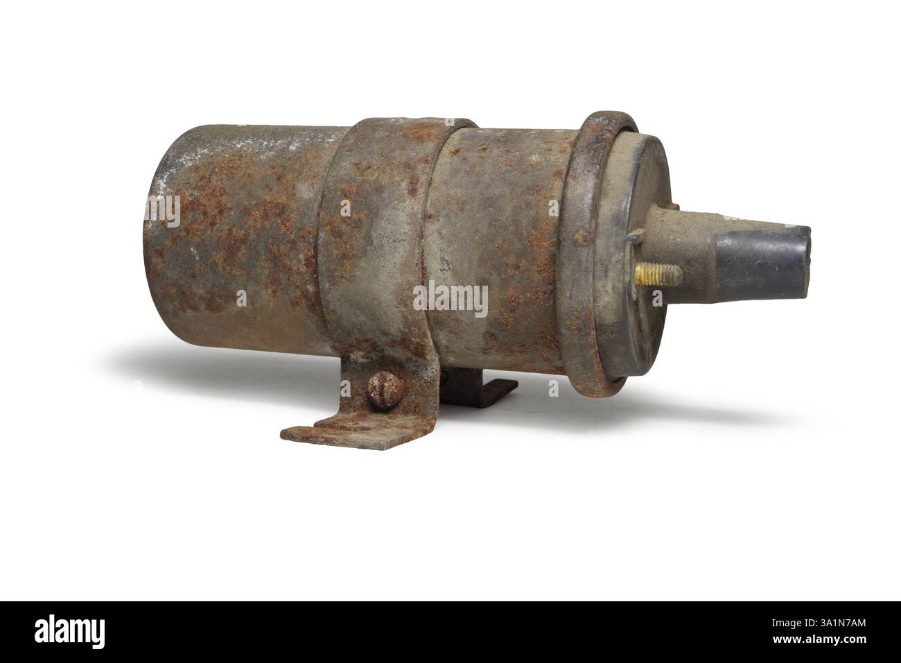 conventional ignition coil in clamp with holes for fixing the coil. old ...