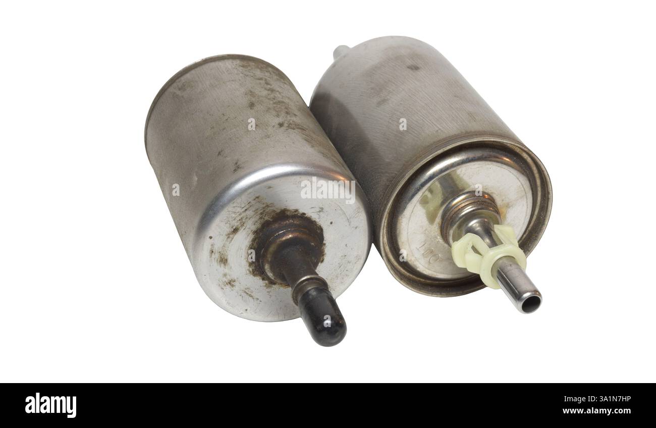 fuel filters pair, old and new, with plastic plugs on universal fits to ...