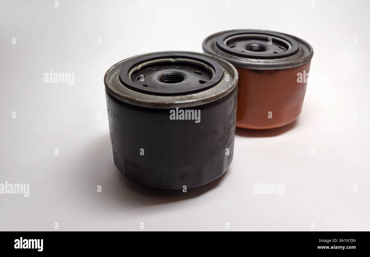 full flow oil filters, used, dismantled for replace, drops shadows on ...
