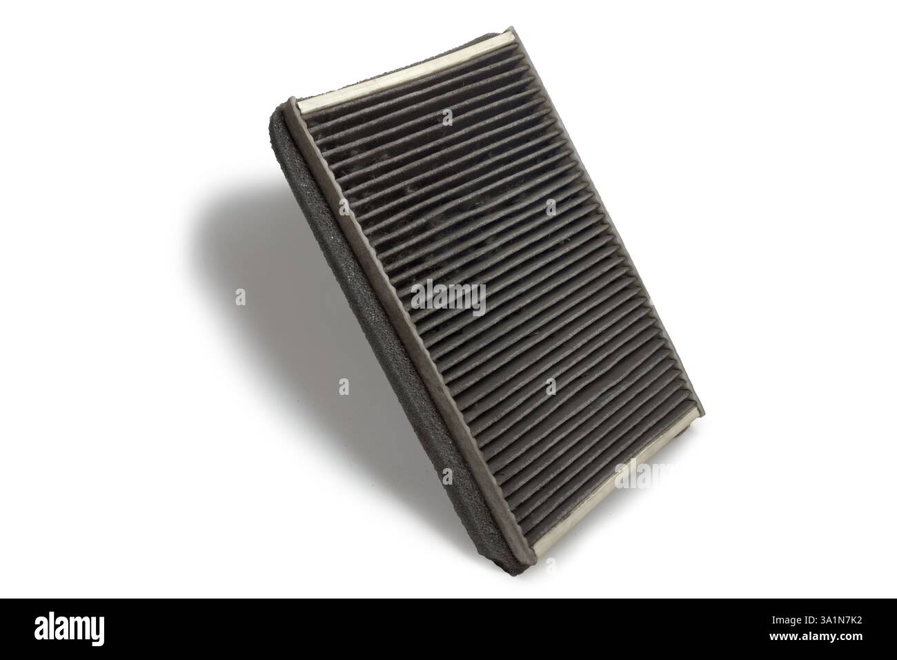 cabin air filter, used one, with clogged carbon filtering media, drops ...