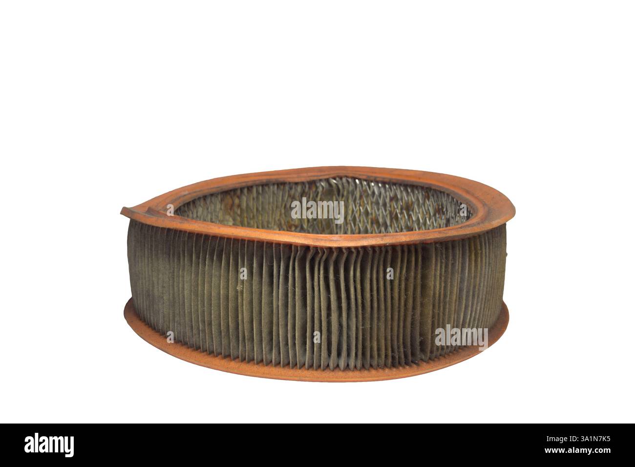 engine round air filter, with clogged up paper media. old, dusty and ...