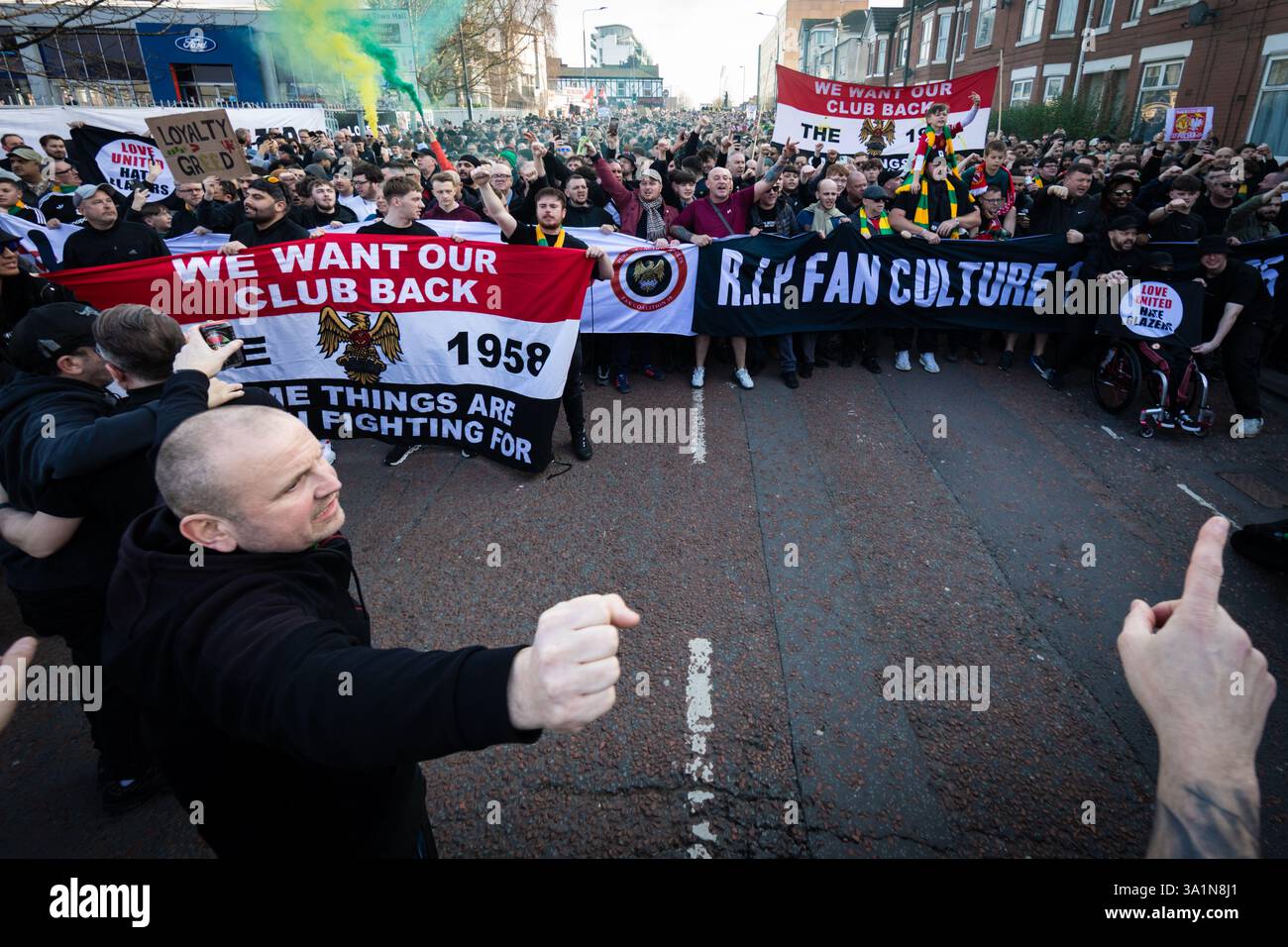 Manchester united fans flags hi-res stock photography and images - Alamy