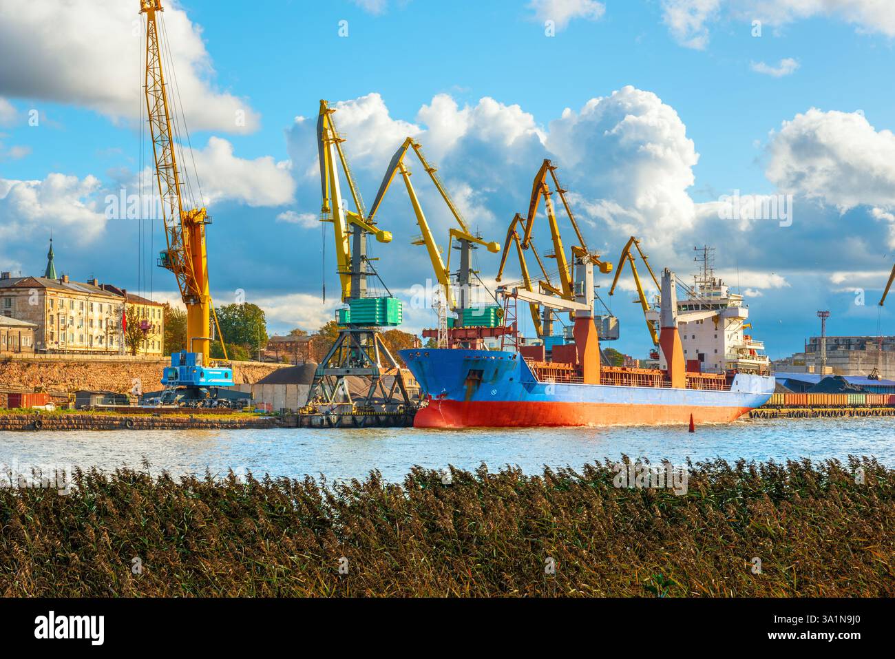 Dry -loaded vessel in the sea port of the city of Vyborg Stock Photo ...