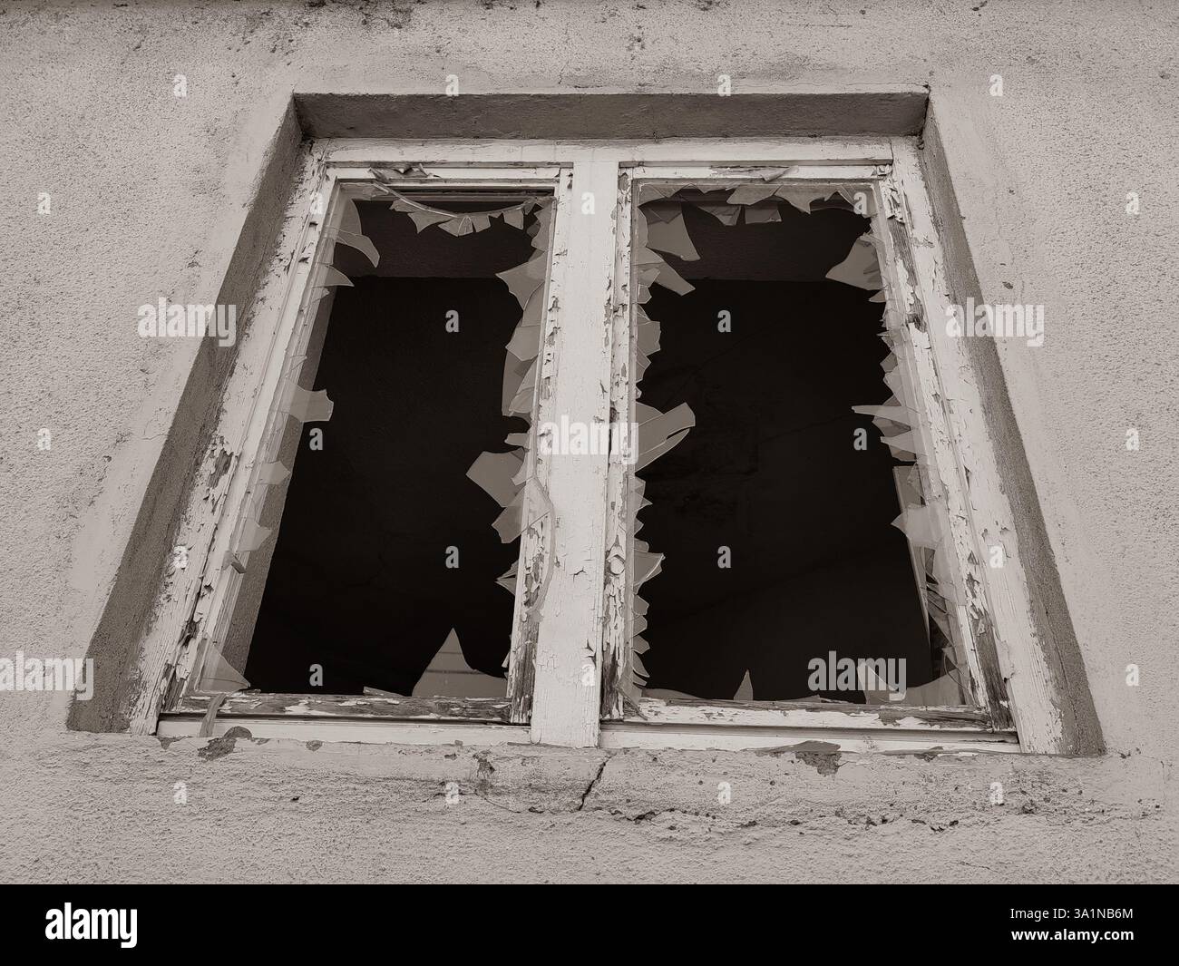 Shattered Past – Broken Window of an Abandoned House Stock Photo - Alamy