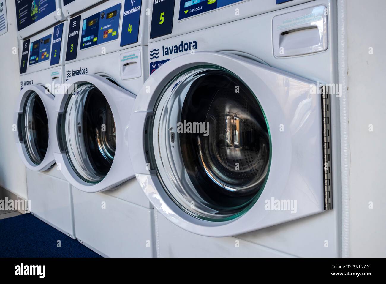 Marilia, Sao Paulo, Brazil, January 31, 2025. Row of washing machines ...