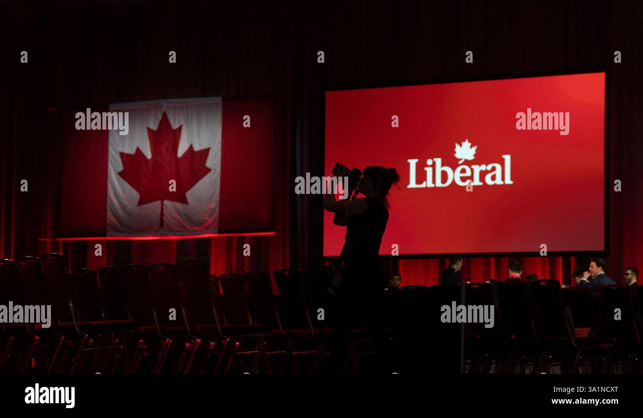 A photographer takes pictures of the Liberal leadership room ahead of a ...
