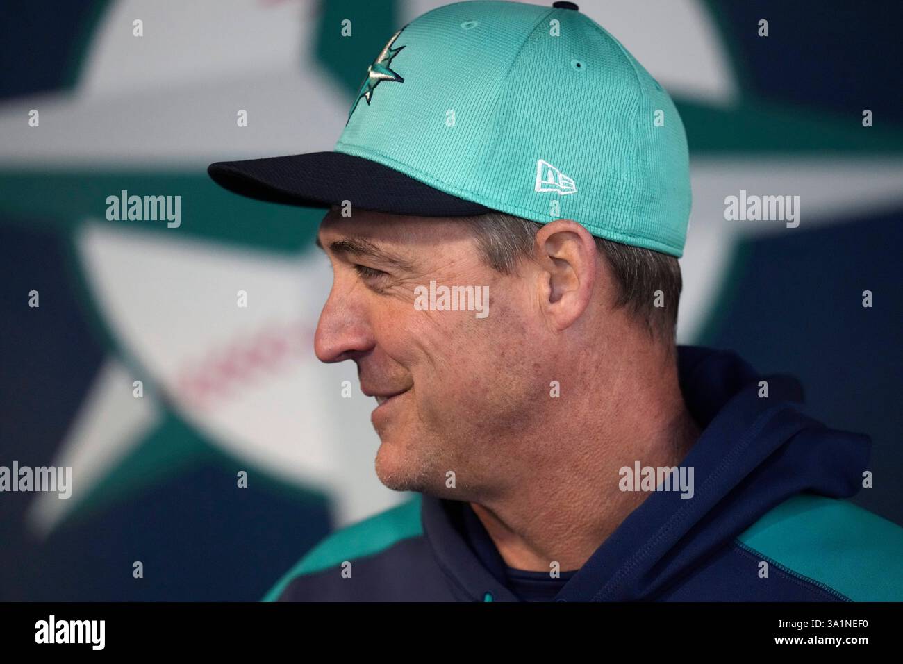 Seattle Mariners manager Dan Wilson pauses in the dugout prior to a ...