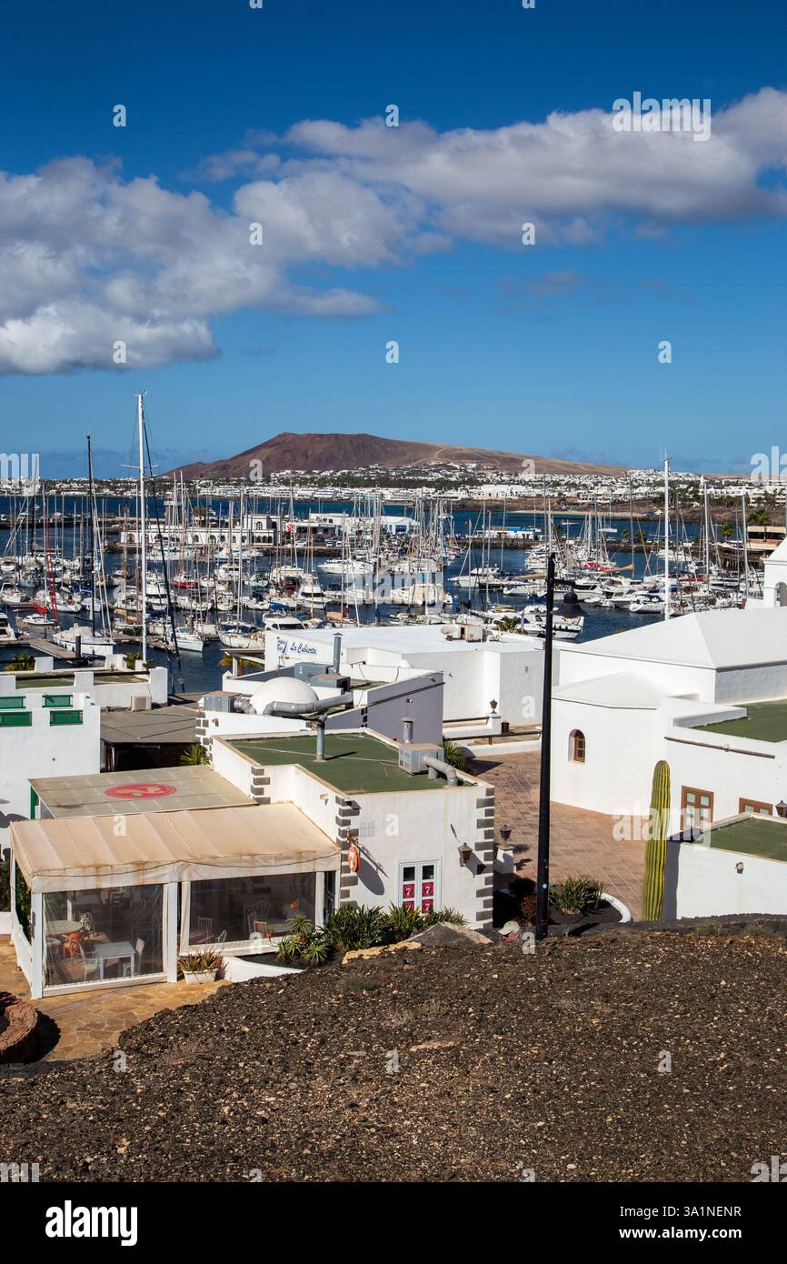 View over the Rubicon marina looking towards the red mountain volcano ...
