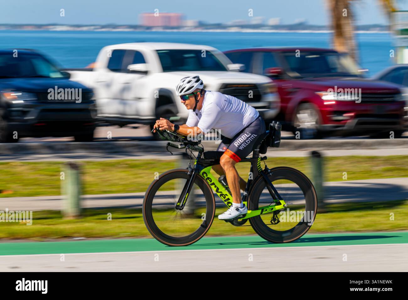 Key Biscayne Miami, FL, USA - March 8, 2025: Man riding a bike. Long ...