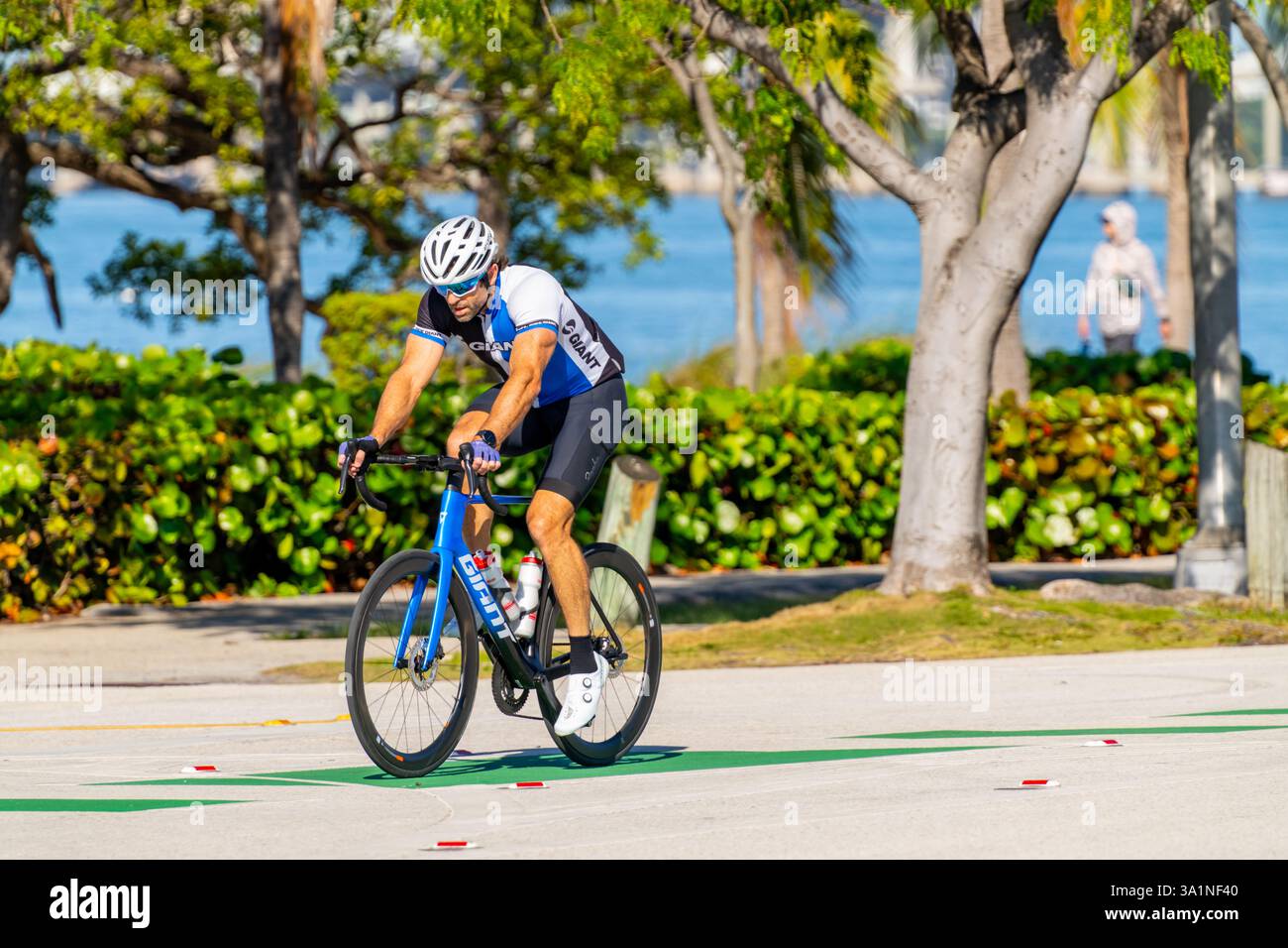 Key Biscayne Miami, FL, USA - March 8, 2025: Man riding a giant road ...