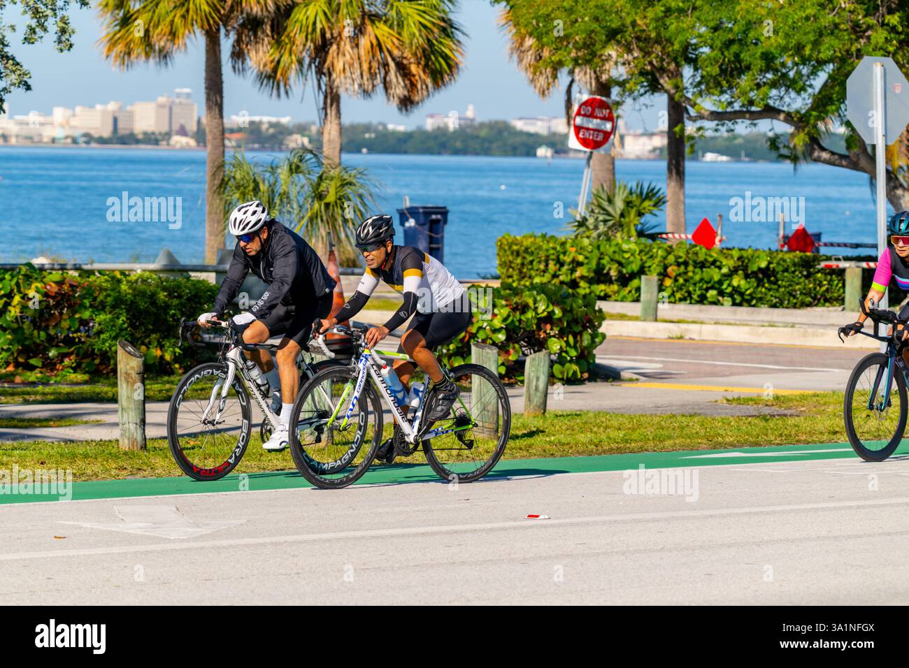 Key Biscayne Miami, FL, USA - March 8, 2025: Friends, bike riding ...
