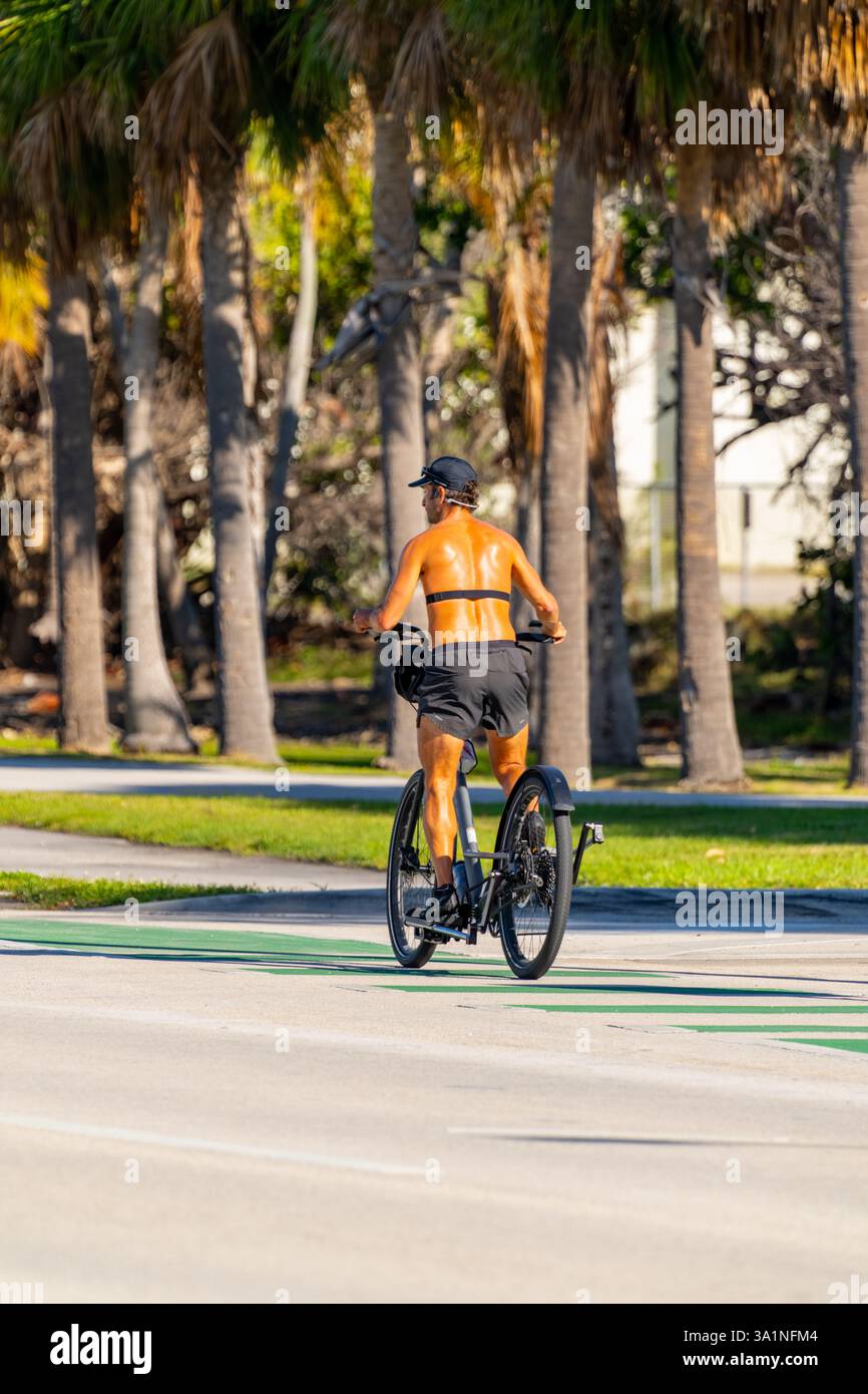 Key Biscayne Miami, FL, USA - March 8, 2025: Man riding a Cyclete ...