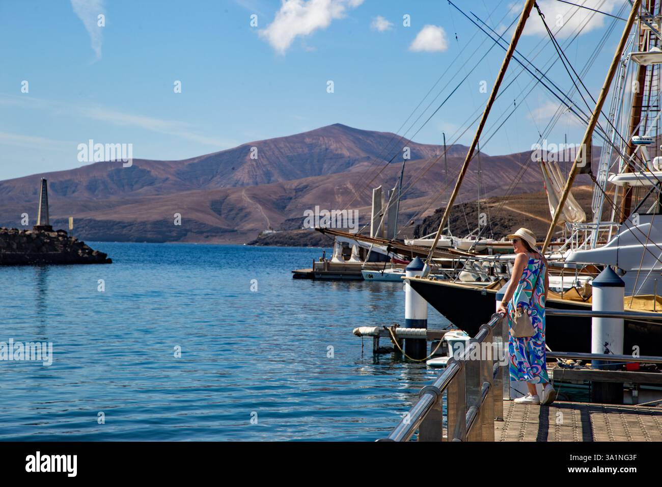 Boats and yachts in the harbour marina at the Spanish Canary resort of ...