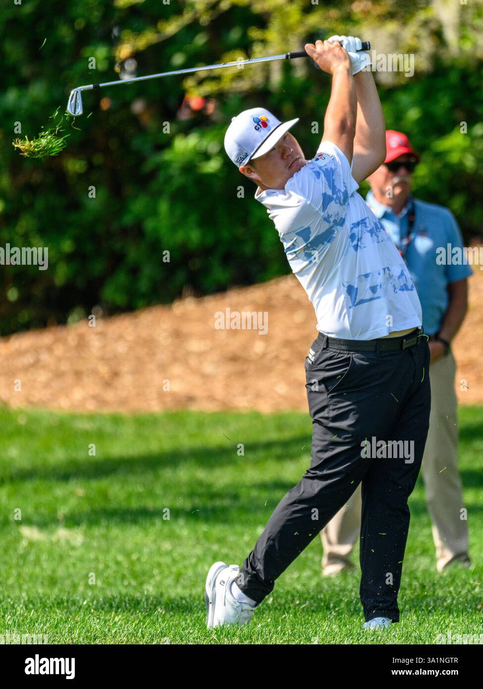 Orlando, FL, USA. 9th Mar, 2025. Sungjae Im of Korea hits from the ruff ...