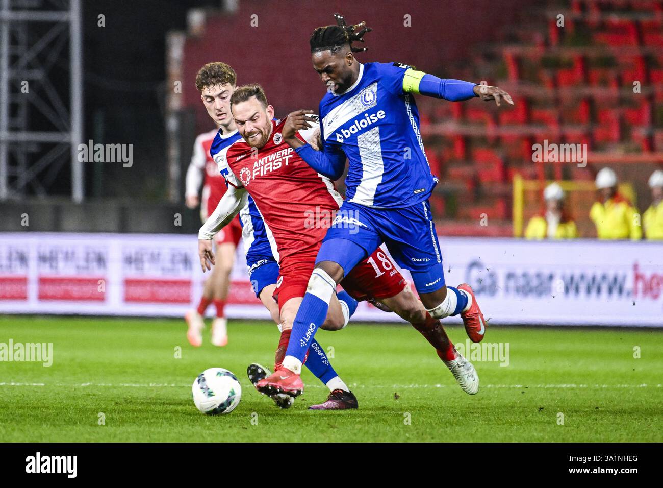 Gent's Mathias Delorge, Antwerp's Vincent Janssen and Gent's Jordan ...