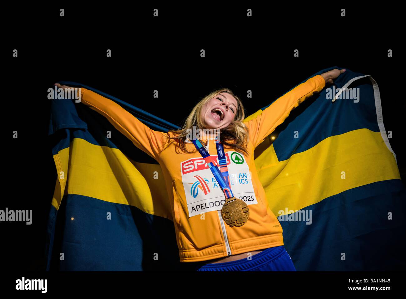 Engla Nilsson of, Sweden. , . poses with a Swedish flag and her bronze ...