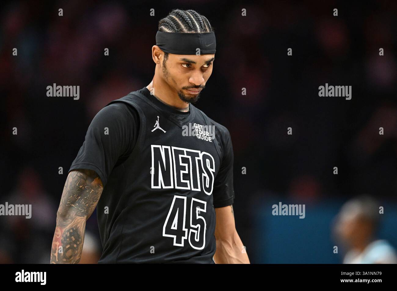 Brooklyn Nets guard Keon Johnson (45) looks on during the seecond half ...