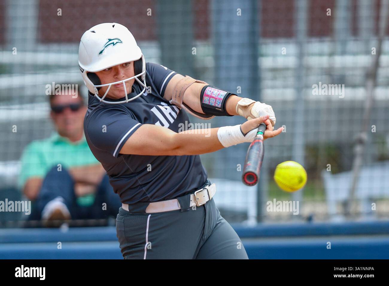 Jacksonville's Averi Harcus (4) bats during an NCAA softball game ...