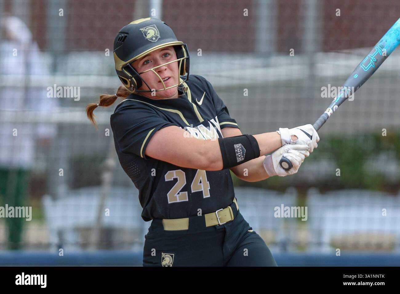 Army outfielder Breanna Coonfare (24) bats during an NCAA softball game ...