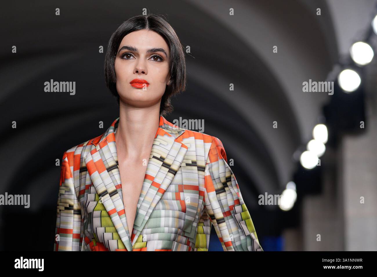 A model walks the runway during Carlos Gil fashion show at ModaLisboa ...