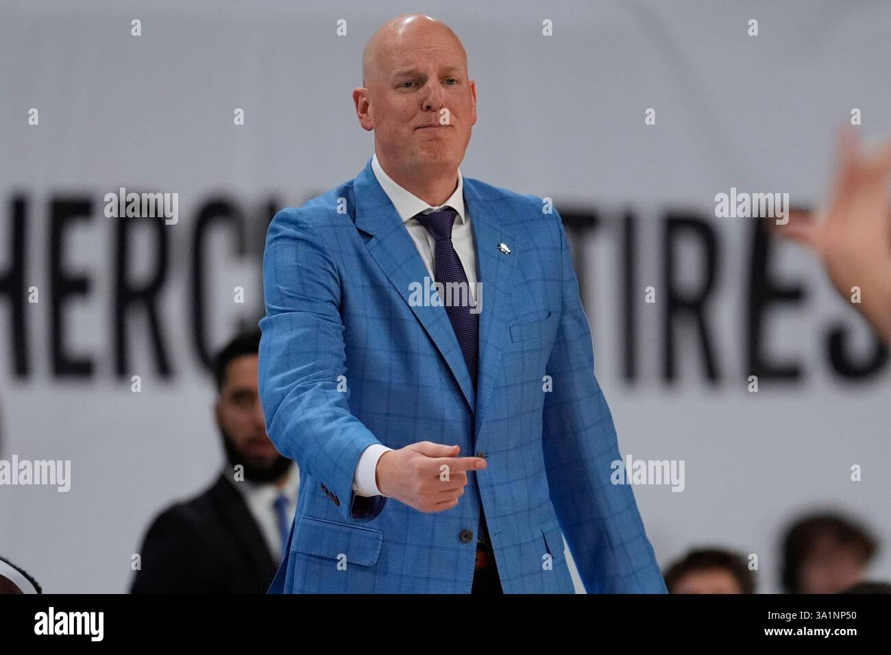 High Point head coach Alan Huss looks onto the court during the first ...