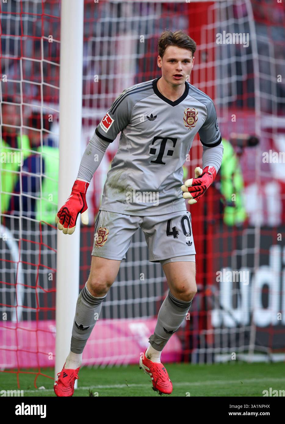 MUNICH, GERMANY - MARCH 08: Jonas Urbig of Bayern Muenchen looks on ...
