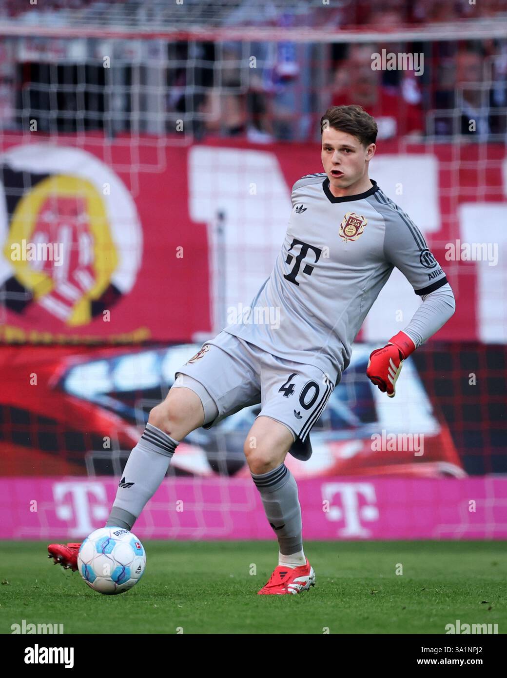 MUNICH, GERMANY - MARCH 08: Jonas Urbig of Bayern Muenchen in action ...