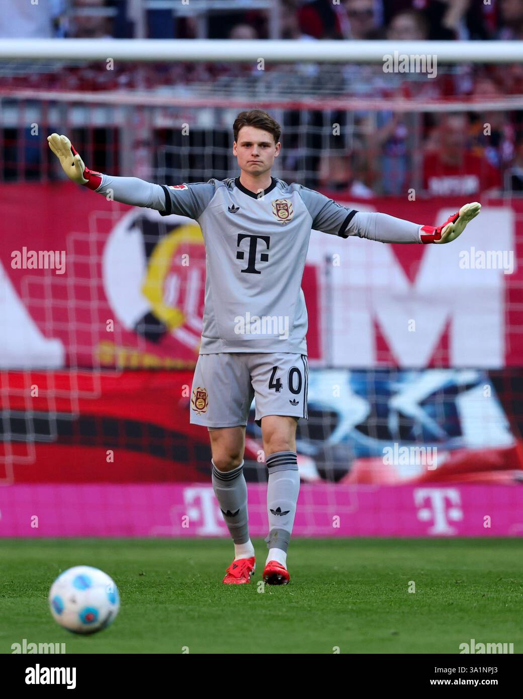 MUNICH, GERMANY - MARCH 08: Jonas Urbig of Bayern Muenchen looks on ...