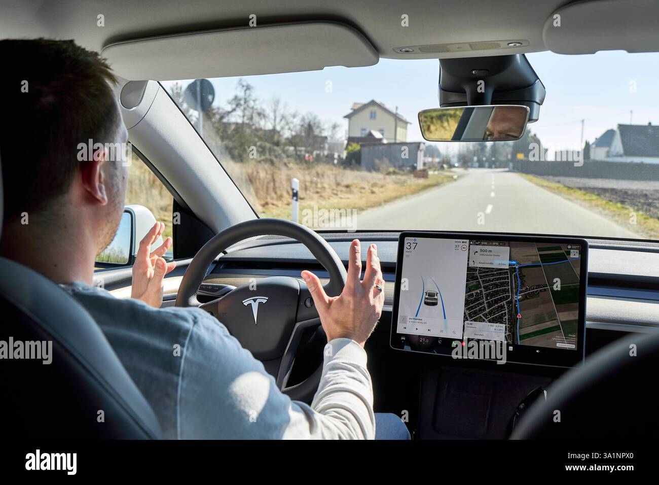 Bavaria, Germany - March 9, 2025: A Tesla Model Y is driving in ...
