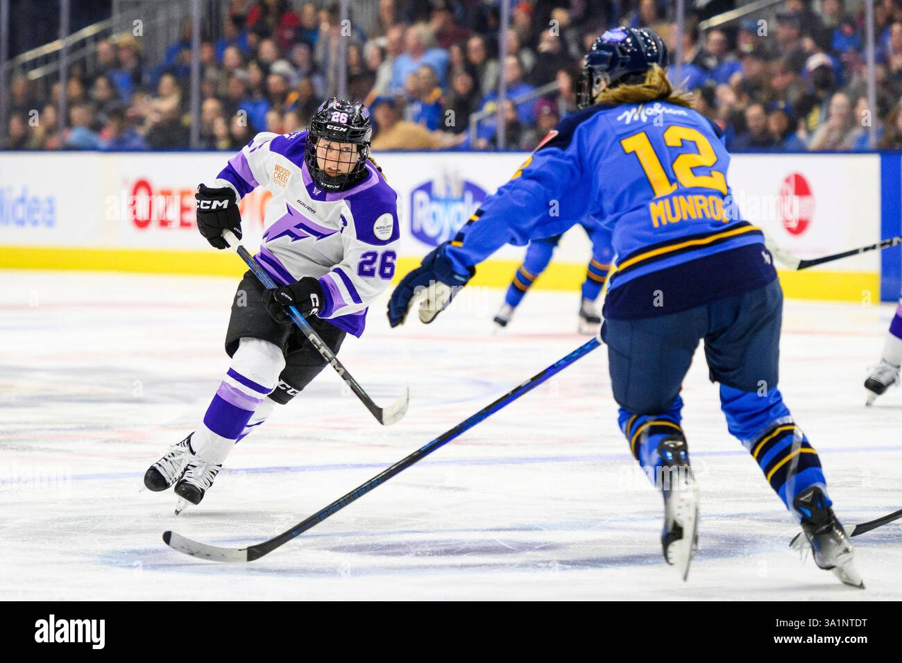 Minnesota Frost forward Kendall Coyne Schofield (26) advances downice ...