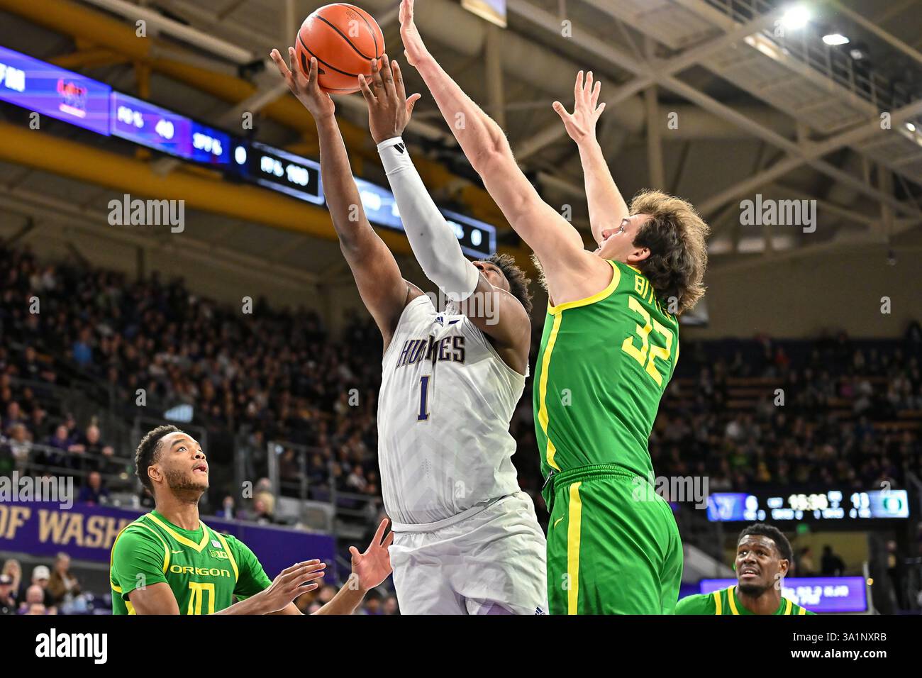 March 09, 2025: Washington Huskies forward Great Osobor (1) goes up for ...