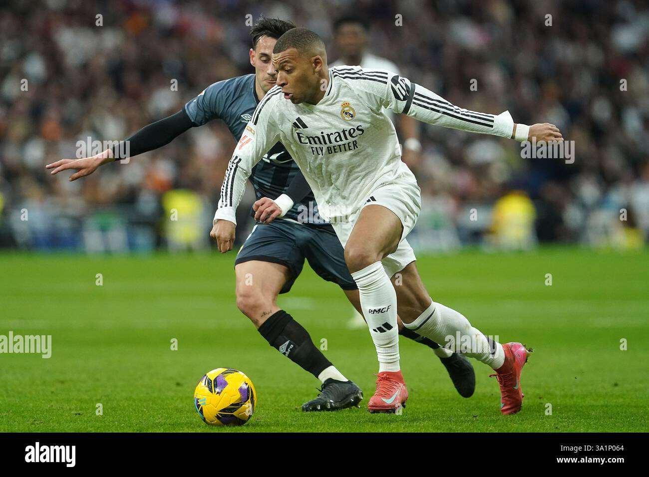 Madrid, Spain. 09th Mar, 2025. Real Madrid CF's Kylian Mbappe (r) and ...