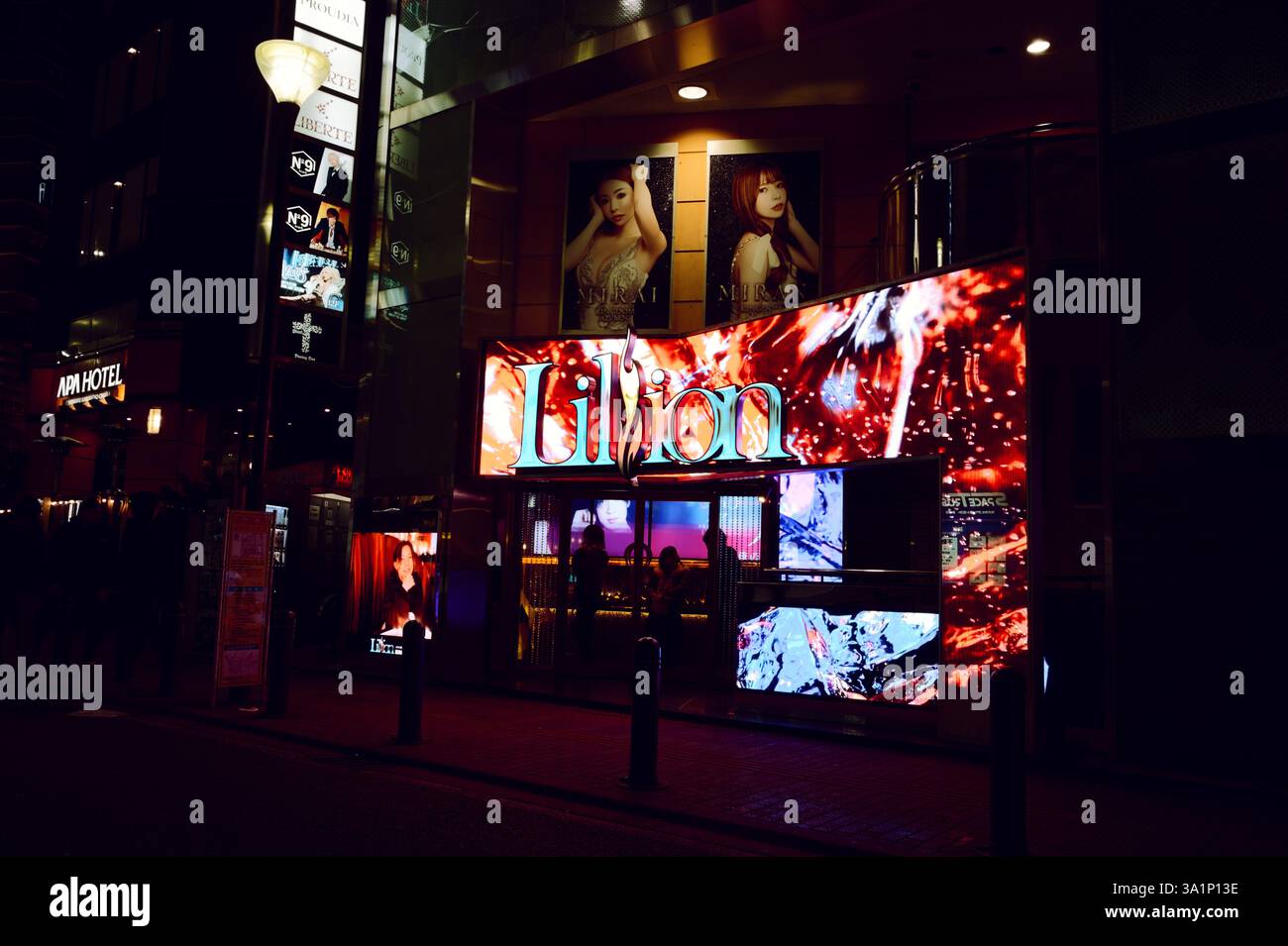 Tokyo, Japan - January 11th 2025 - Illuminated entrance of a nightclub ...